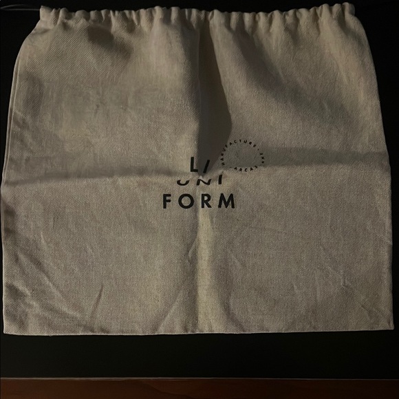 l/uniform | Bags | Luniform Beige Drawstring Bag | Poshmark